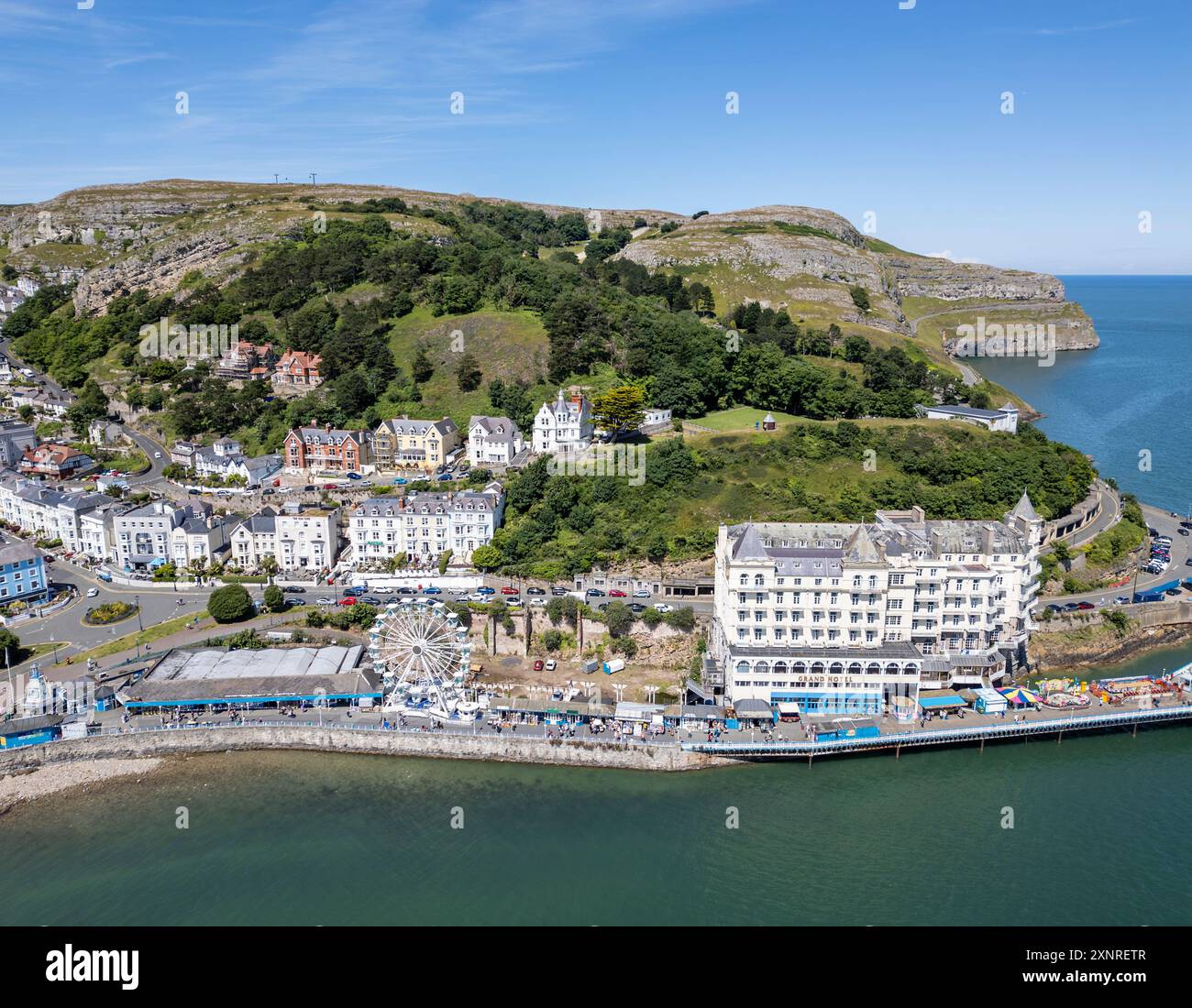 Grand Hotel, ferris wheel and the Great Orme headland, Llandudno Bay ...