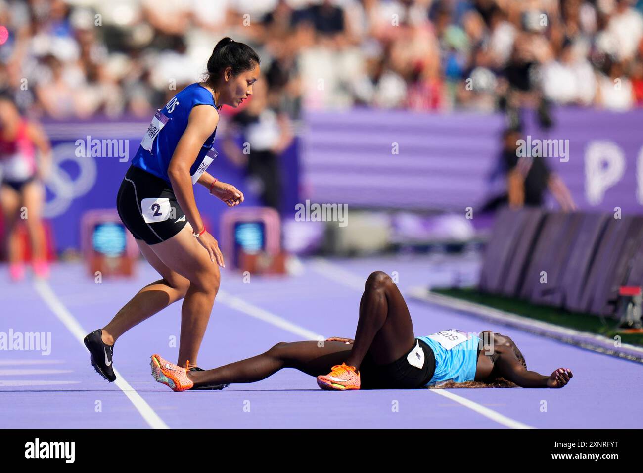 Silina Pha Aphay, of Laos, helps Lucia Moris, of South Sudan, during a ...