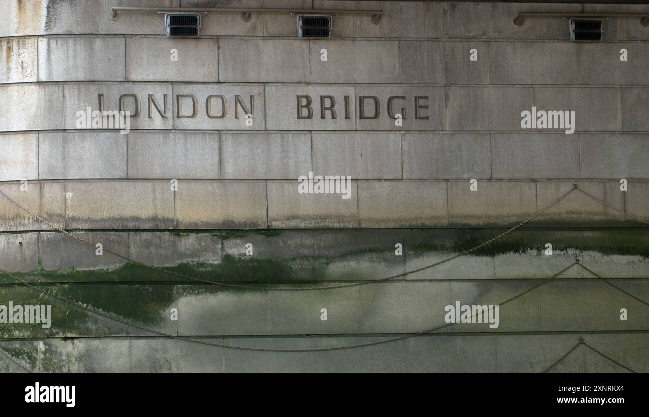 London Bridge signage, located under the bridge on the River Thames, It ...