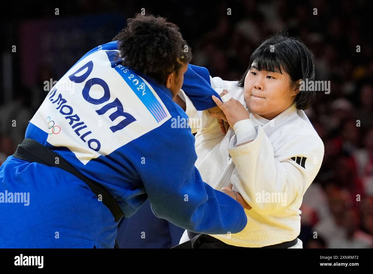 South Korea's Hayun Kim and Moira Morillo, of Dominican Republic ...