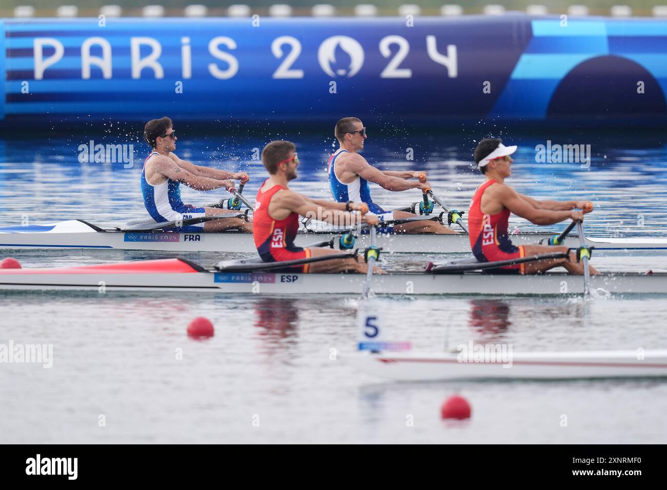 France's Hugo Beurey and Ferdinand Ludwig (top) compete in the Rowing ...