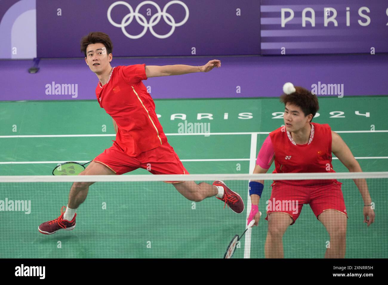 China's Liang Weikeng, right, and Wang Chang play against Malaysia's ...