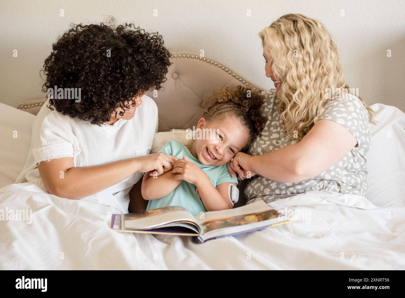 Being tickled hi-res stock photography and images - Alamy