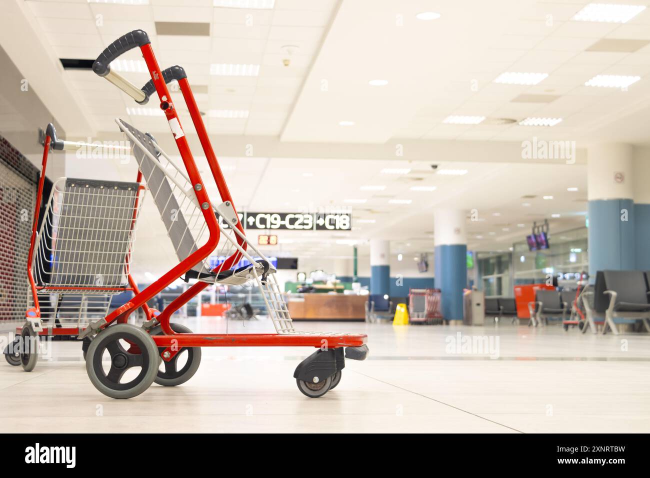 Stroller for transporting children at terminal of airport Stock Photo ...