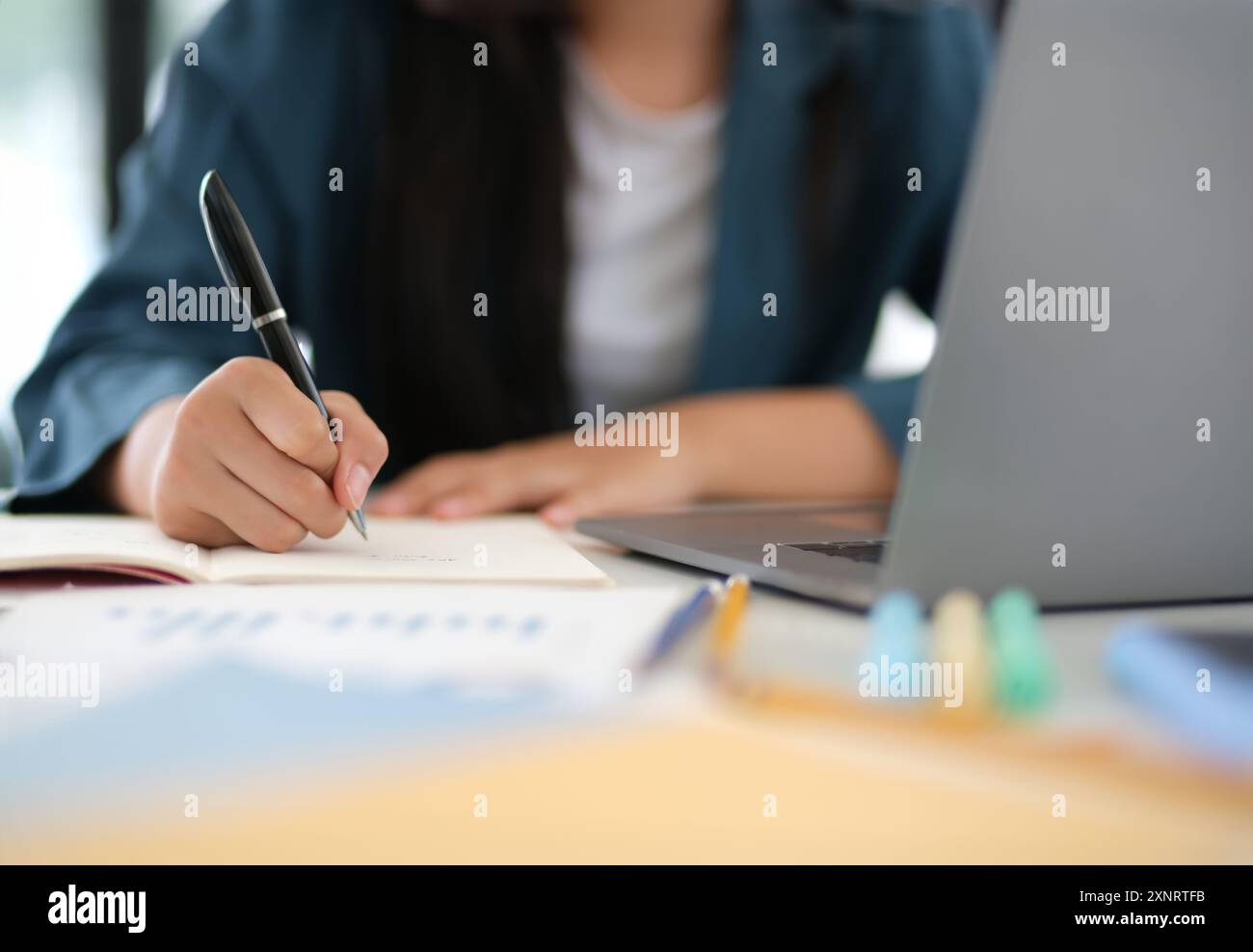 Closeup woman writing in notebook hi-res stock photography and images ...