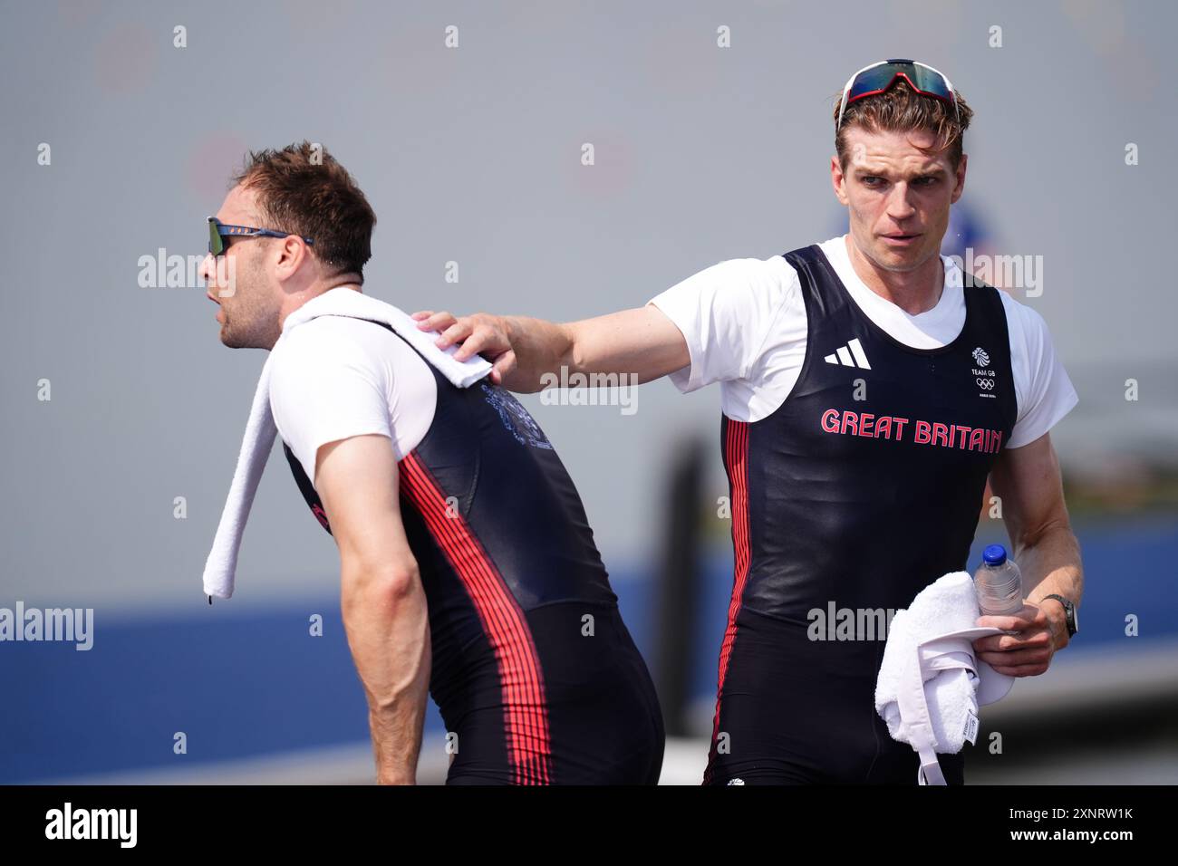 Great Britain's Ollie Wynne-Griffith and Tom George (right) react after ...