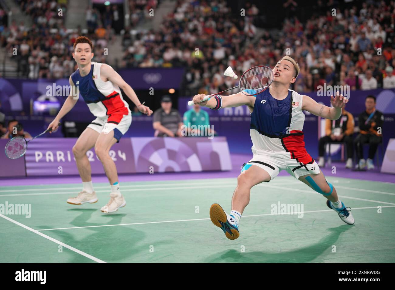 Malaysia's Aaron Chia, right, and Soh Wooi Yik play against China's ...