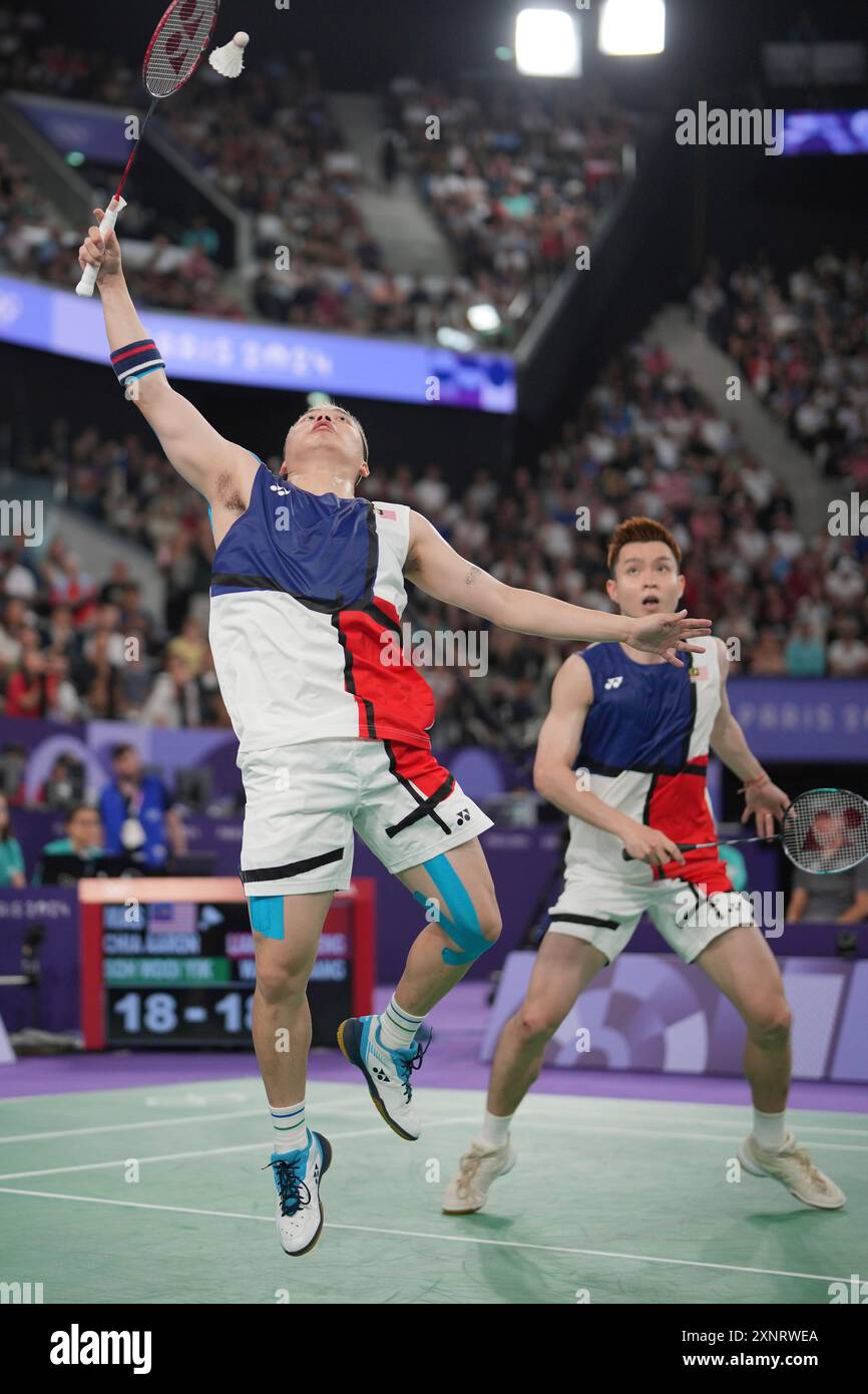 Malaysia's Aaron Chia, left, and Soh Wooi Yik play against China's ...