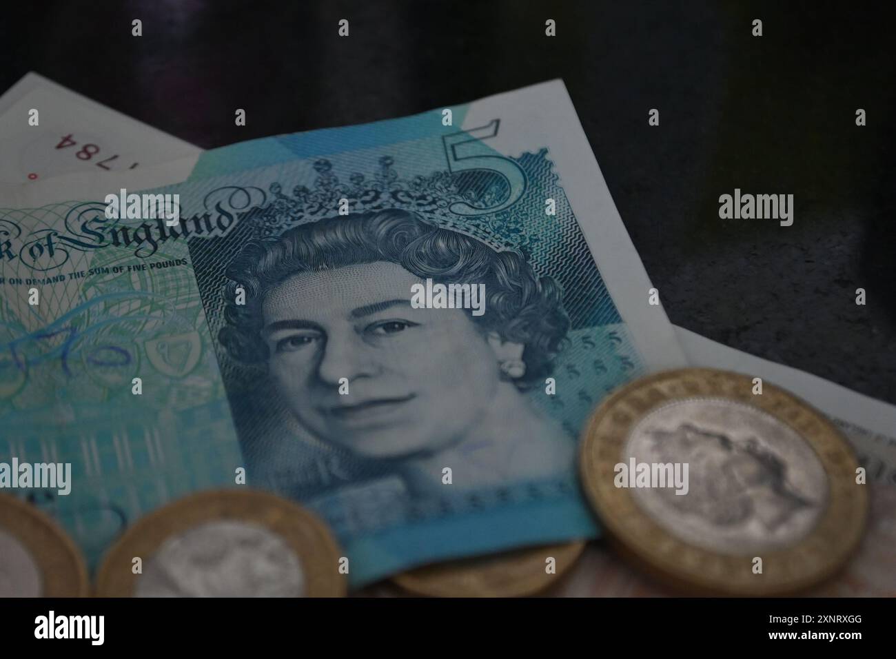 Cash and Coins Stock Photo - Alamy