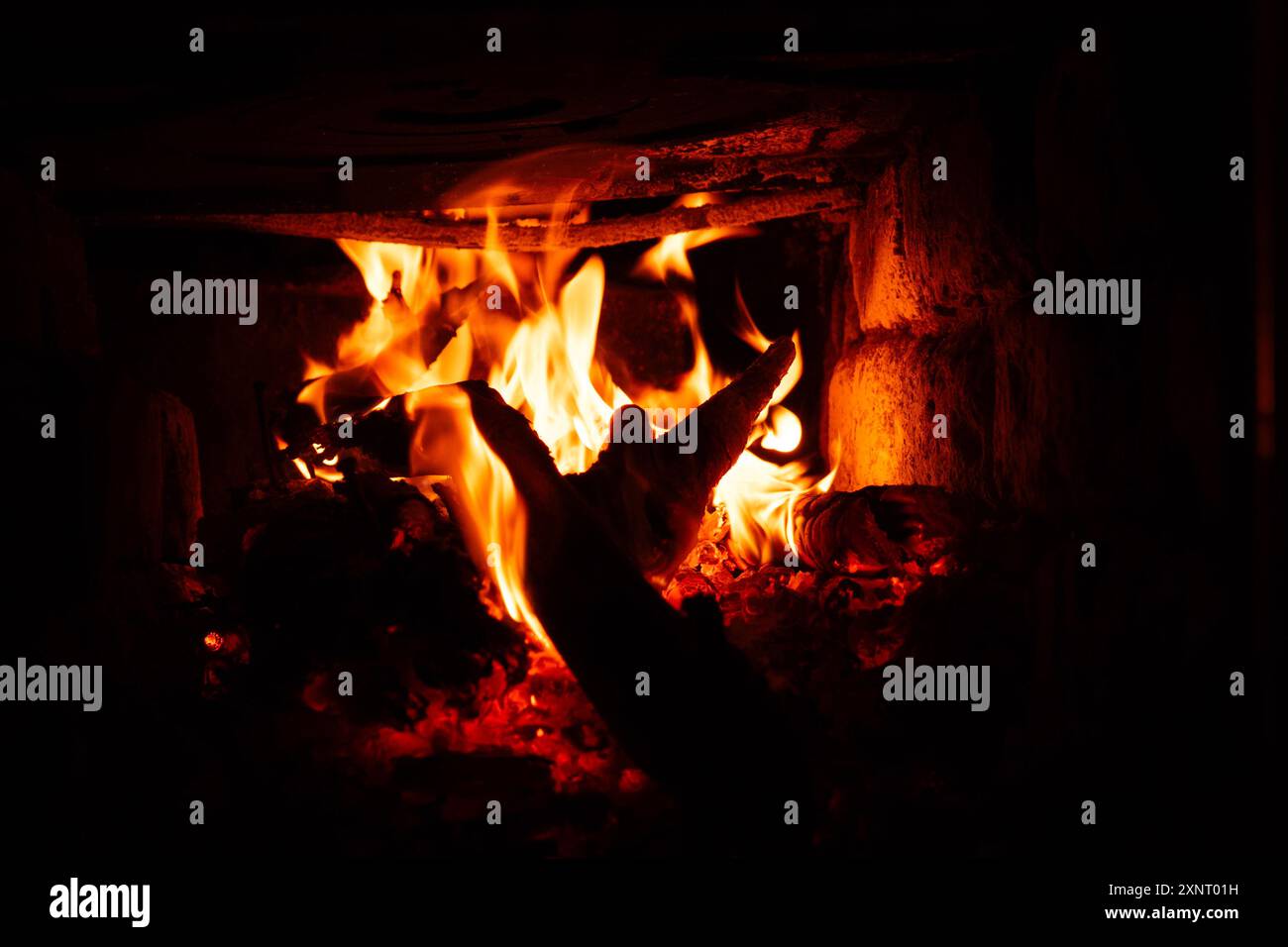 Burning wood in the stove hi-res stock photography and images - Alamy