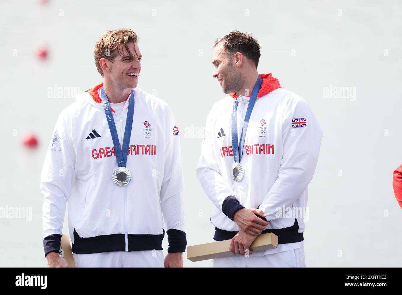 Great Britain's Ollie Wynne-Griffith and Tom George receive their ...