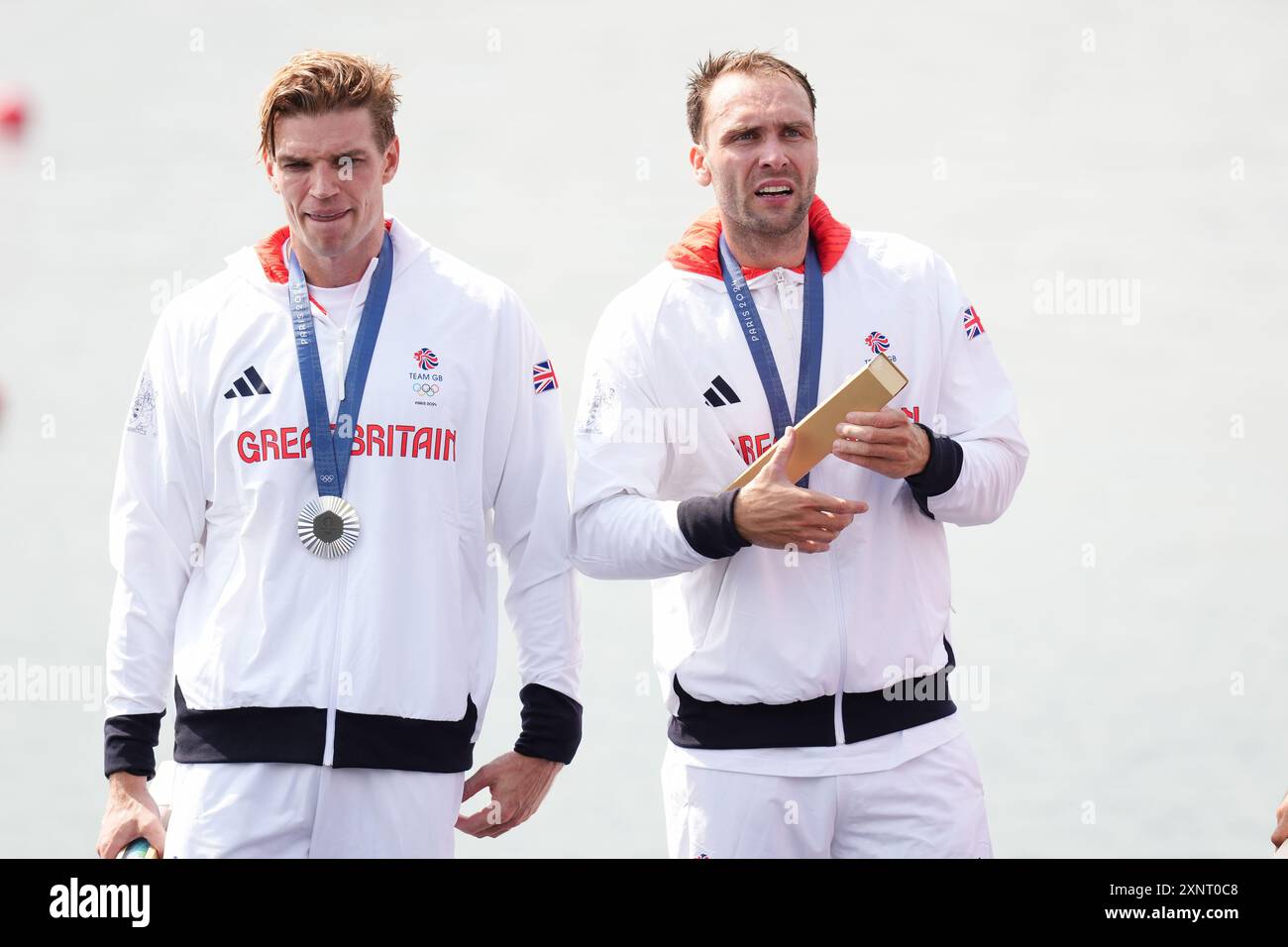 Great Britain's Ollie Wynne-Griffith and Tom George receive their ...