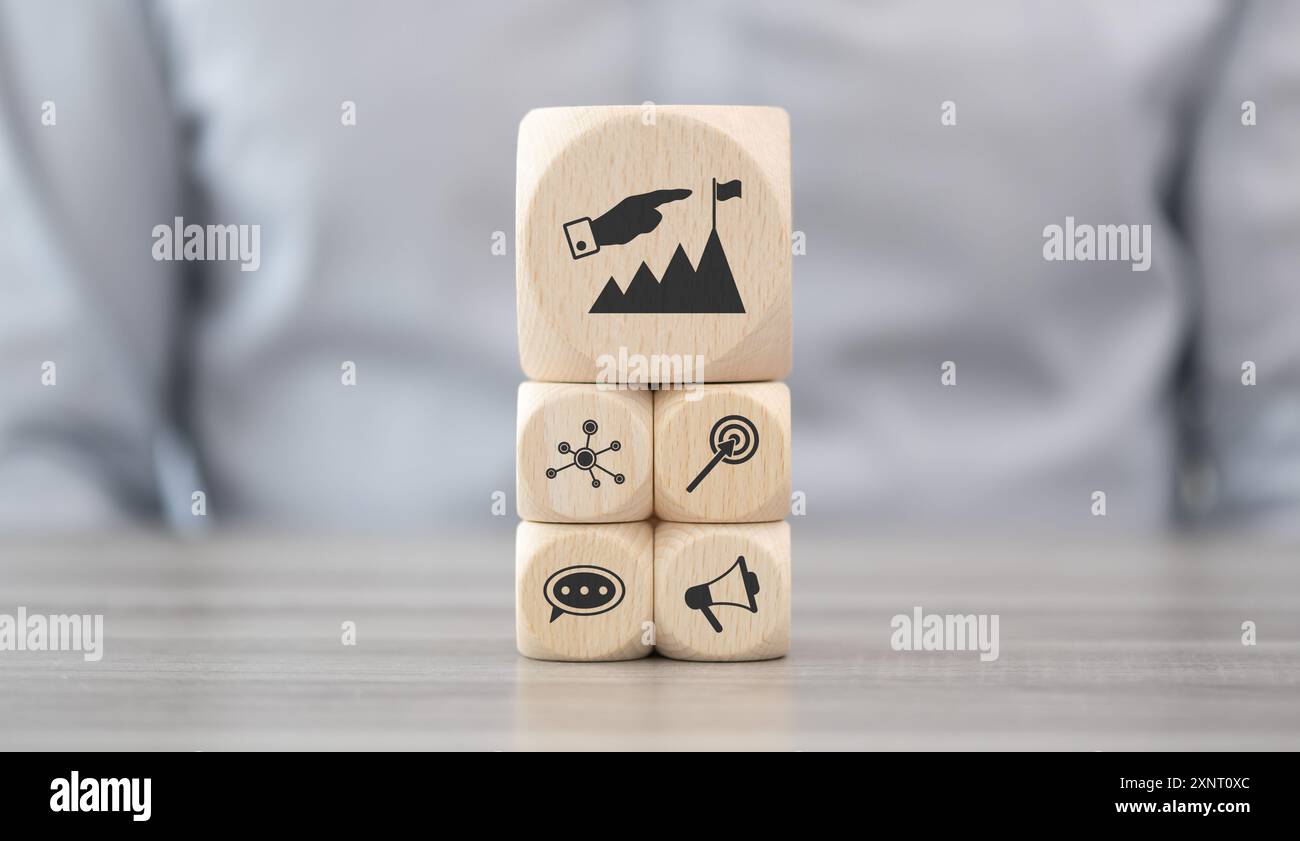Wooden blocks with symbol of coaching concept Stock Photo - Alamy