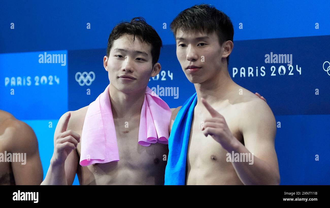 China's Long Daoyi and Wang Zongyuan celebrate after winning the gold ...