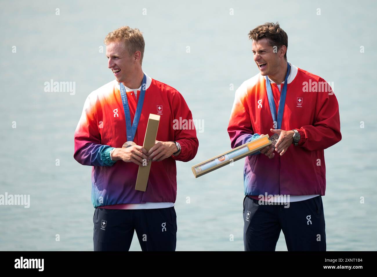 Switzerland's Roman Roeoesli and Andrin Gulich pose for photos with ...