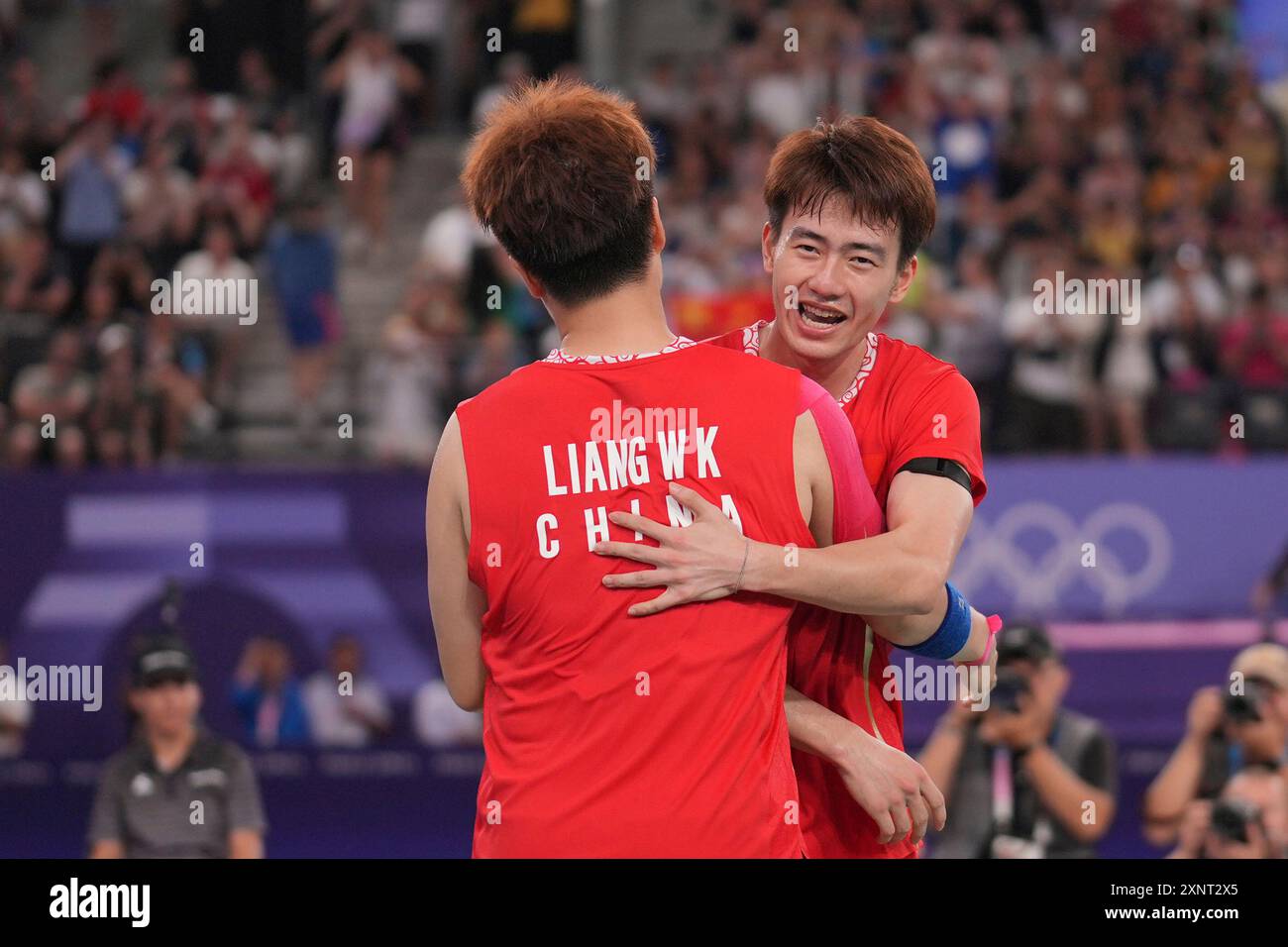 China's Liang Weikeng, left and Wang Chang celebrate after defeating ...