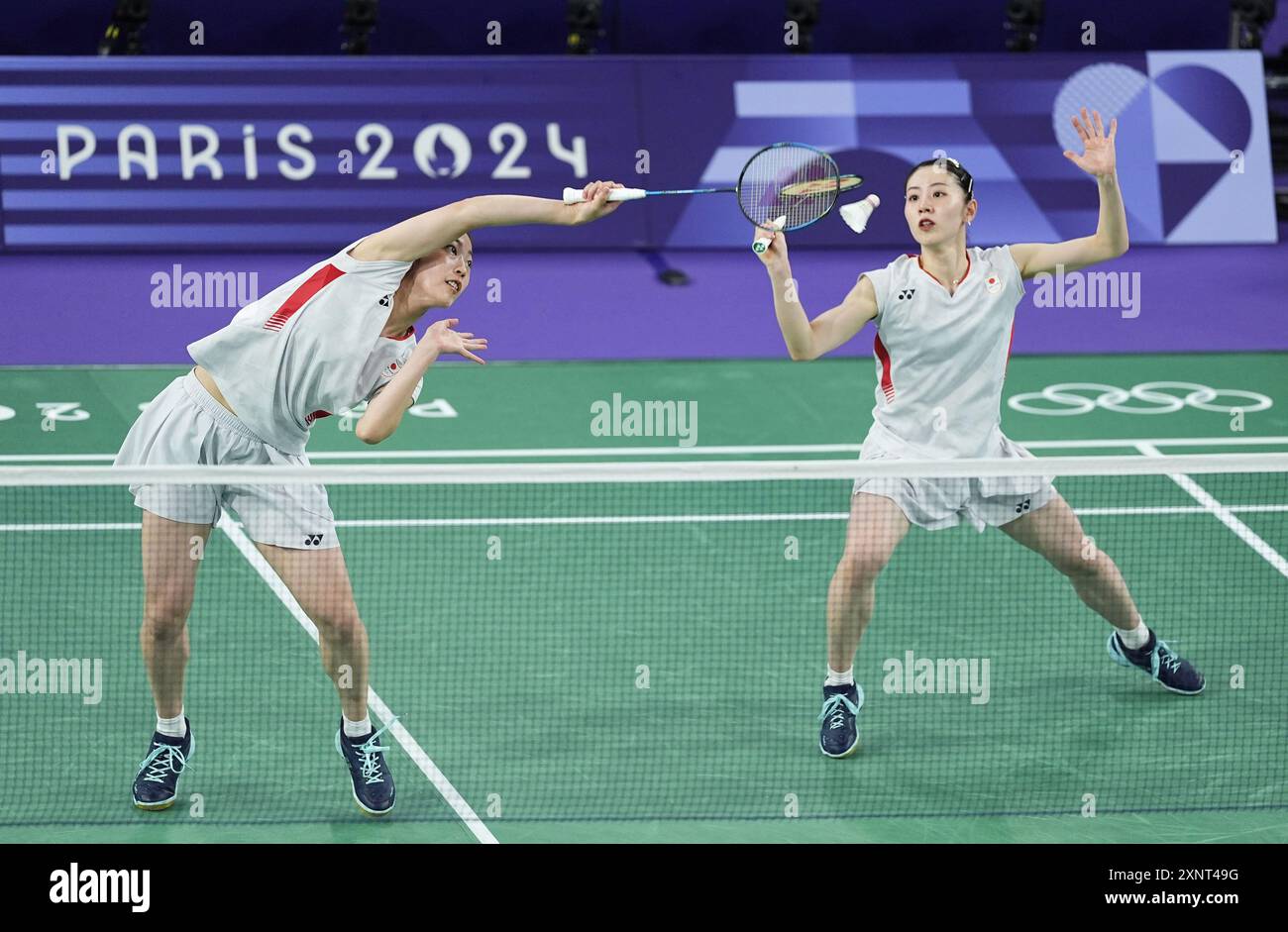 Japan's Chiharu Shida (R) and Nami Matsuyama compete in a badminton ...