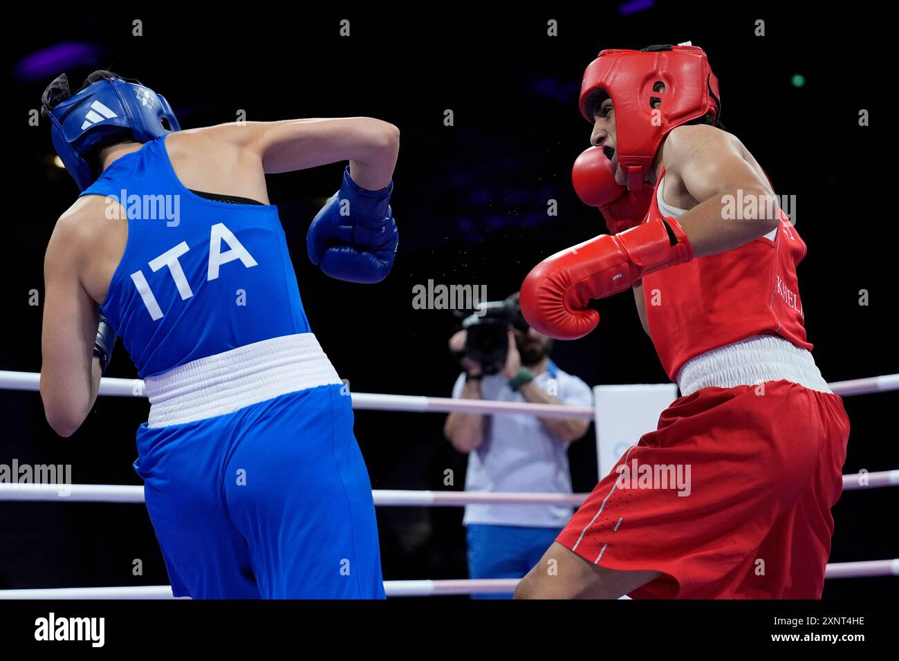 Algeria's Imane Khelif, right, fights Italy's Angela Carini in their ...