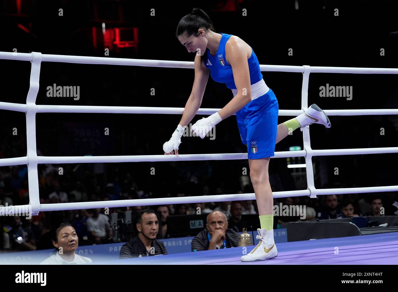 Italy's Angela Carini leaves the ring after abandoning her fight ...