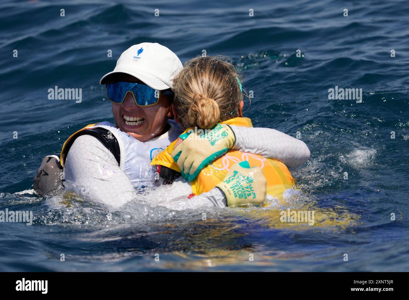 Charline Picon and Skiff Sarah Steyaert of France hug each other after ...