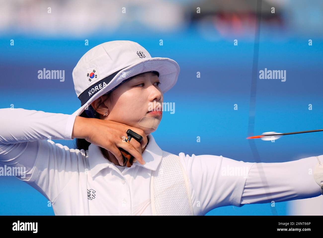 South Korea's Sihyeon Lim shoots during the Archery team elimination ...