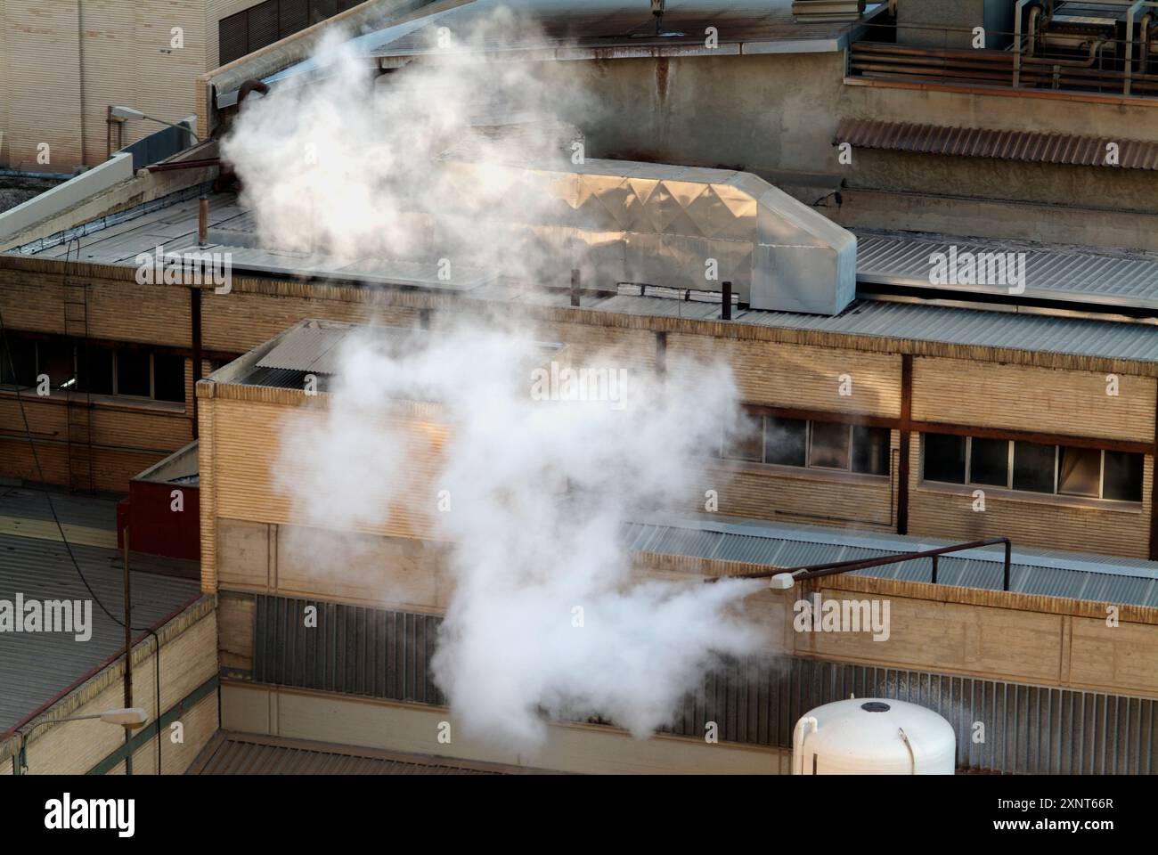 Steam coming out of a building Stock Photo - Alamy