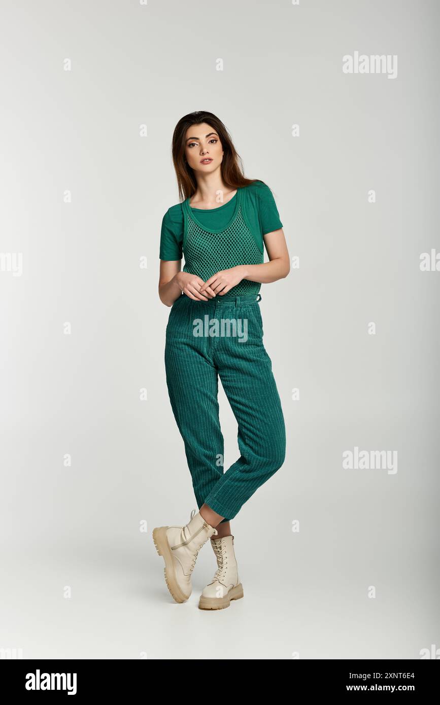 Woman in white jumpsuit poses hi-res stock photography and images - Alamy