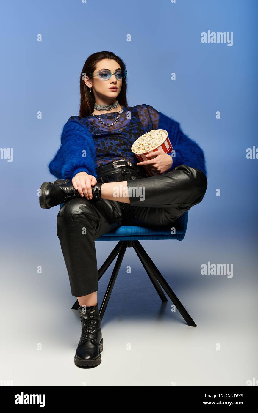 Woman holding bucket popcorn hi-res stock photography and images - Alamy