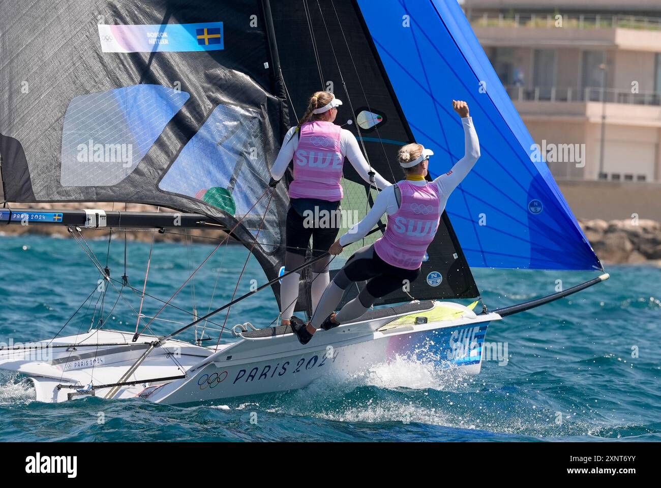 Rebecca Netzler and Vilma Bobeck of Sweden greet the crowd after ...
