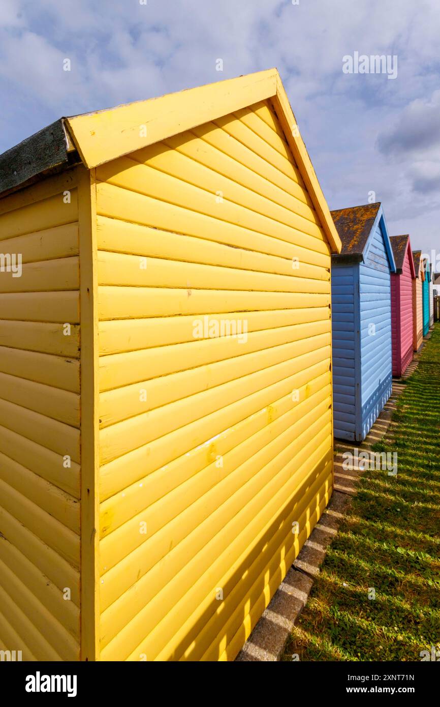 multi coloured colourful beach huts sheds by the sea Amble ...