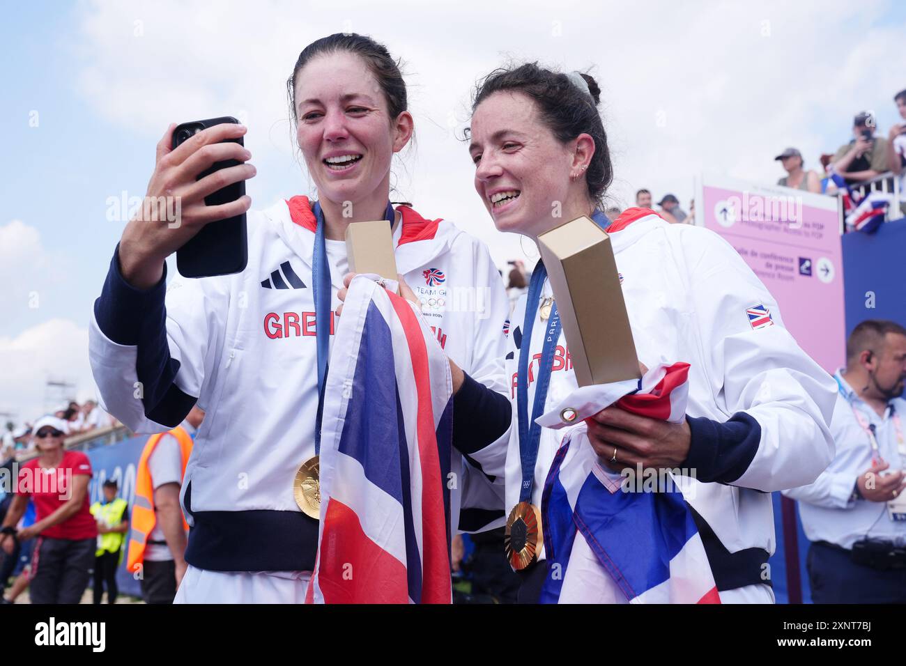 Great Britain's Emily Craig and Imogen Grant with their gold medals ...