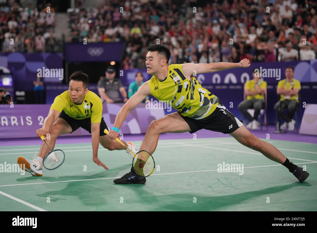 Taiwan's Lee Yang, left, and Wang Chi-Lin play against Denmark's Kim ...
