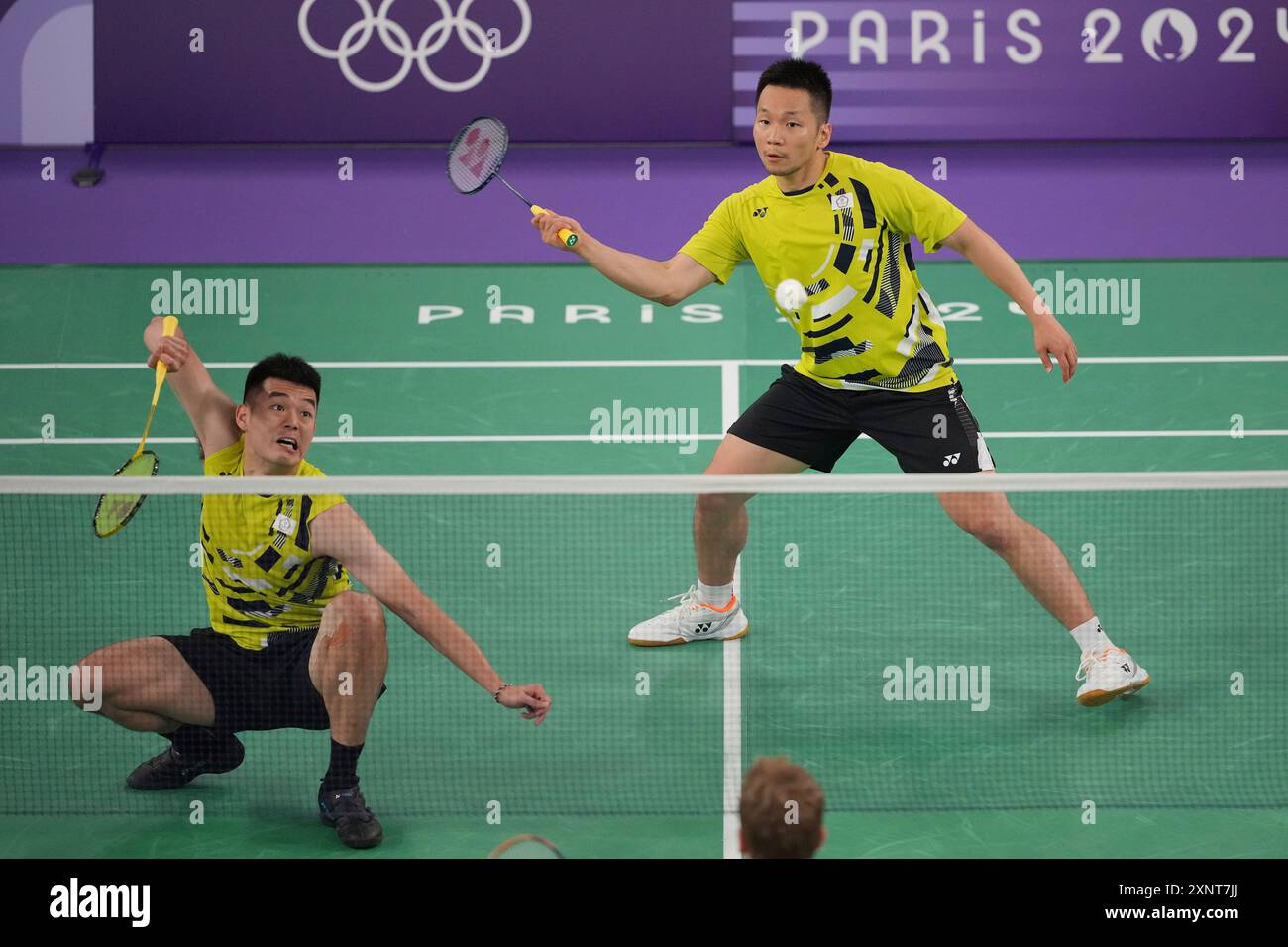 Taiwan's Lee Yang, right, and Wang Chi-Lin play against Denmark's Kim ...