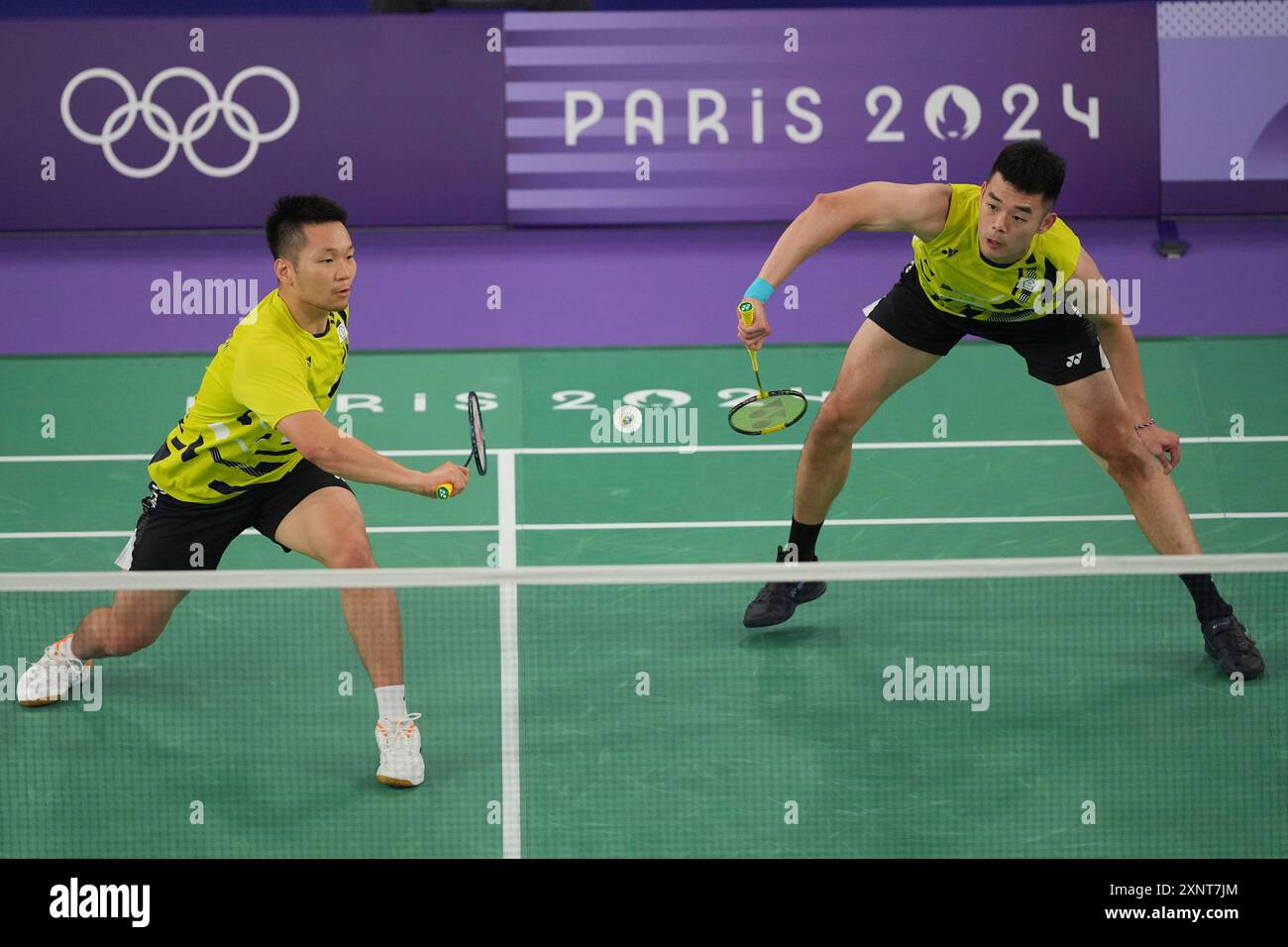 Taiwan's Lee Yang, left, and Wang Chi-Lin play against Denmark's Kim ...