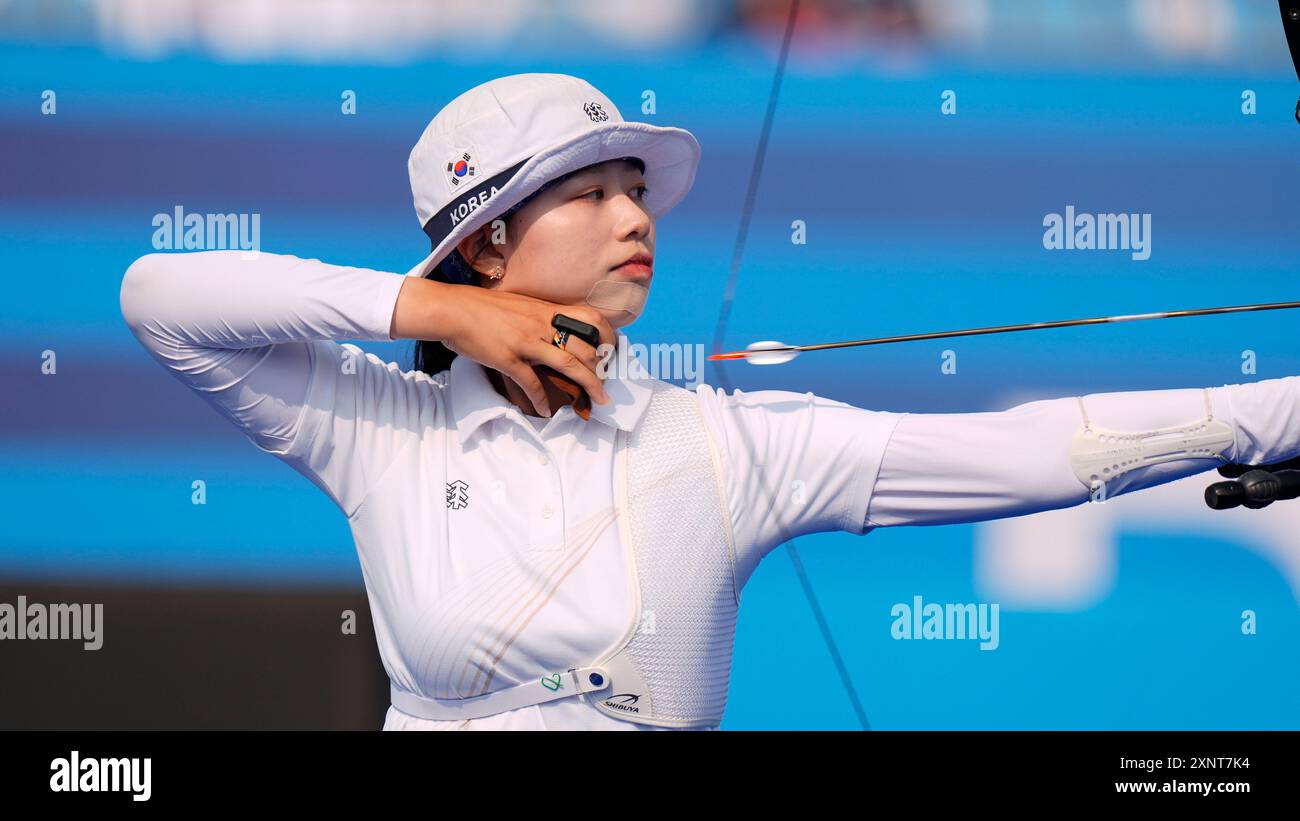South Korea's Sihyeon Lim shoots during the Archery team elimination ...