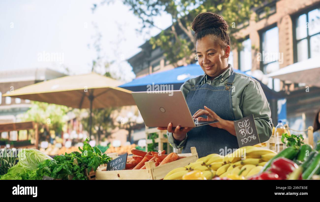Portrait of a Black Female Running a Street Vendor Food Stand with ...