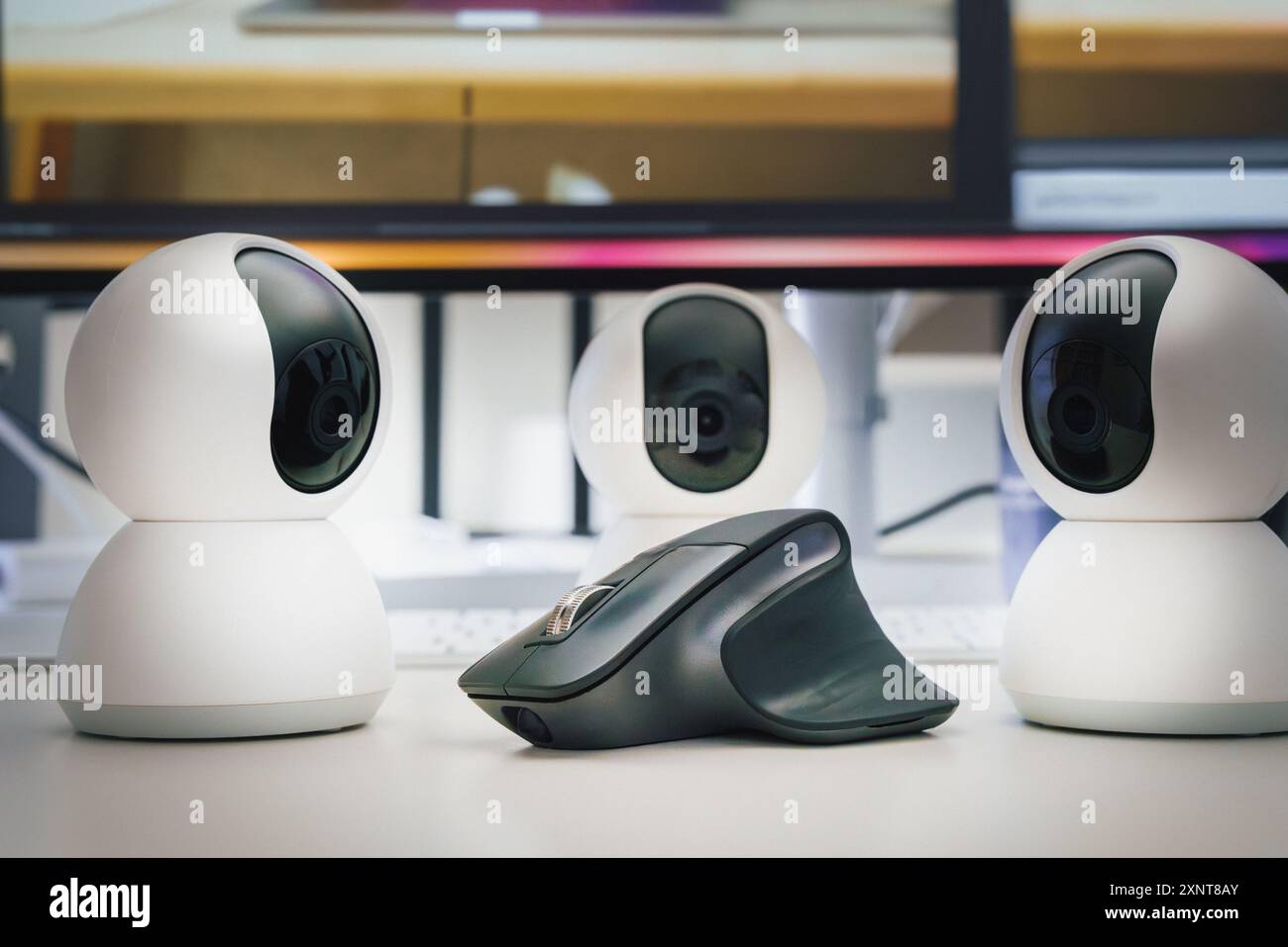 Surveillance web cameras observing computer mouse activity. Office ...