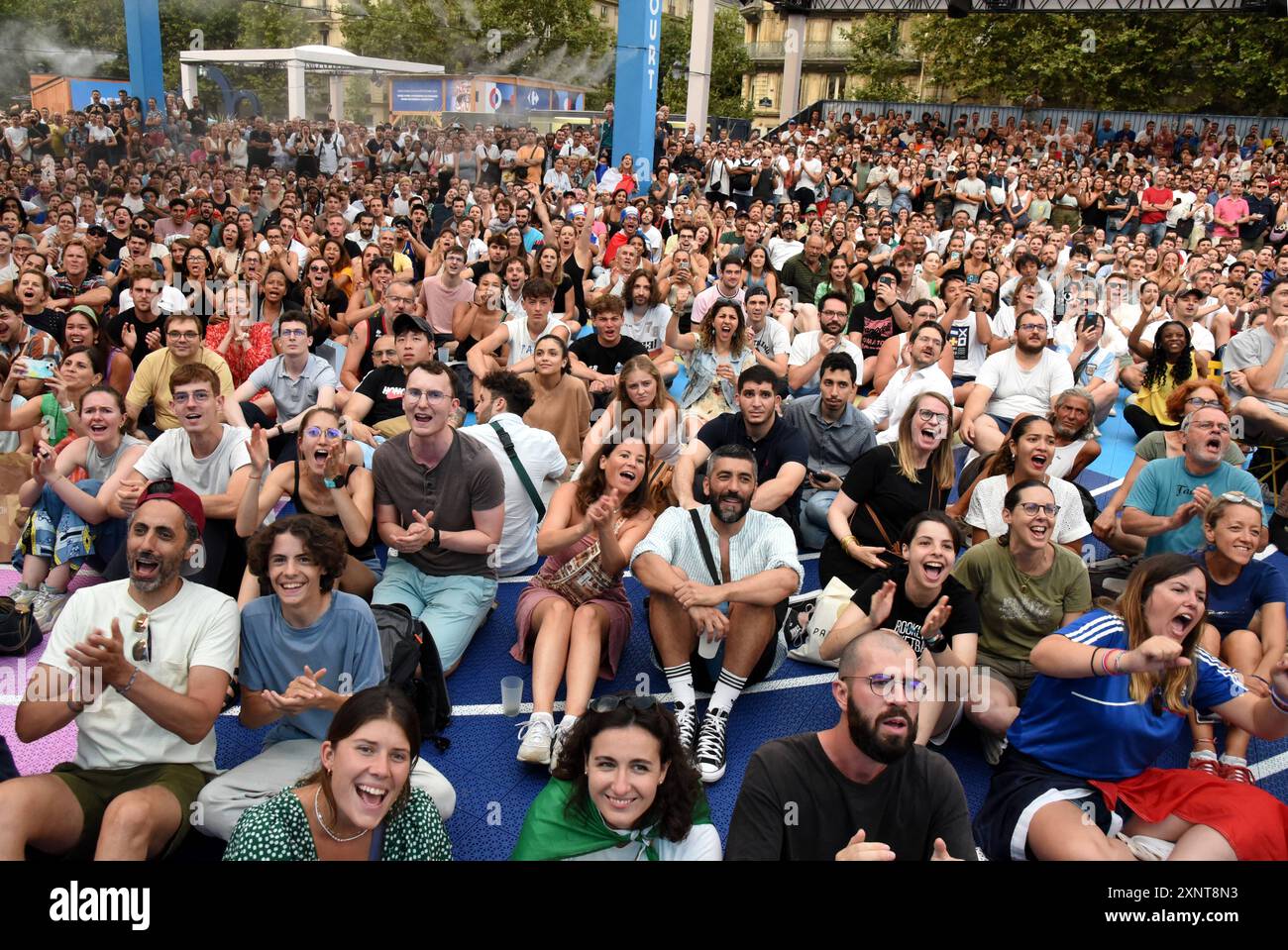 Paris, France. 01st Aug, 2024. Spectators look at a giant screen ...