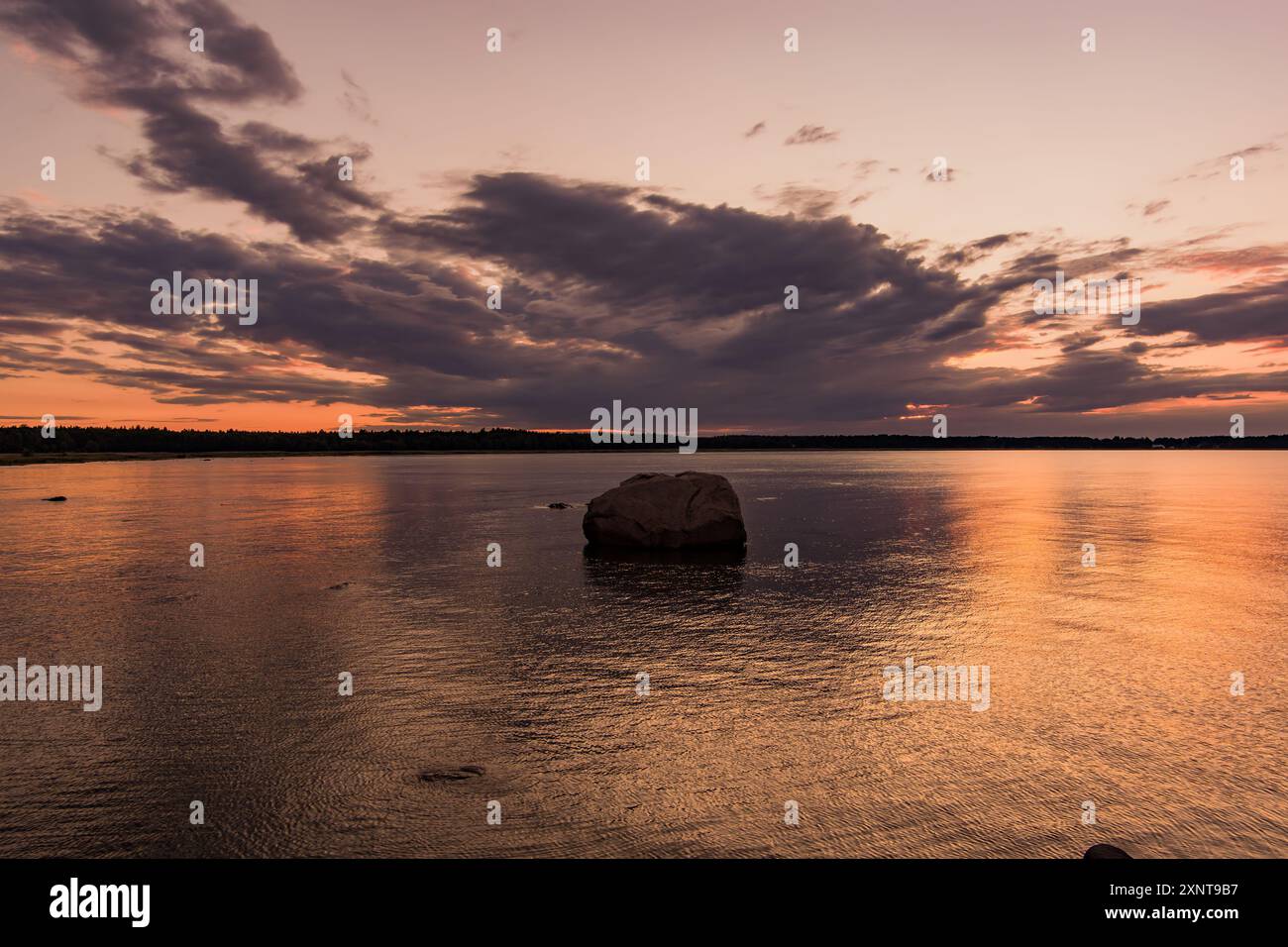 Giant boulder in the water near a beach of Altja, a typical seaside ...