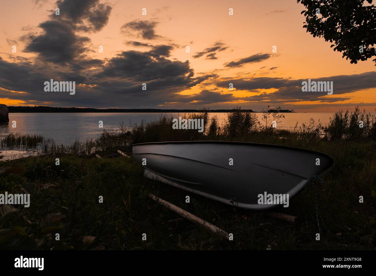Boats, rocks and boulders on a beach of Altja, a typical seaside ...