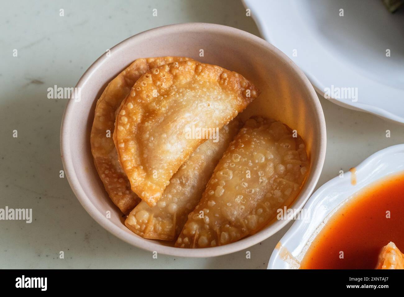 Pastil, a Tausug snack formed like an empanada with a filling of ...