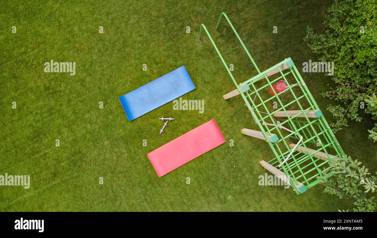 Sports ground and equipment in park aerial top view from above, street ...