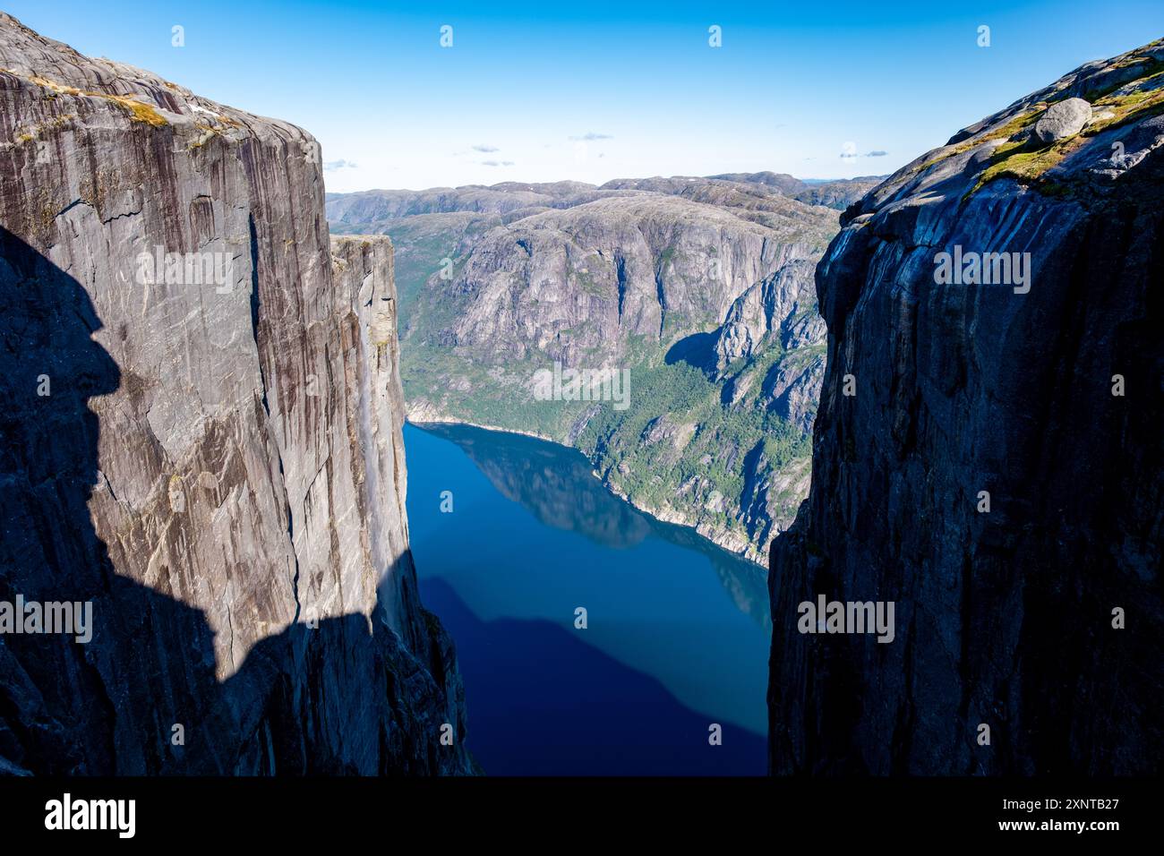 Reflecting the vibrant sky lush greenery kjeragbolten lysefjorden ...