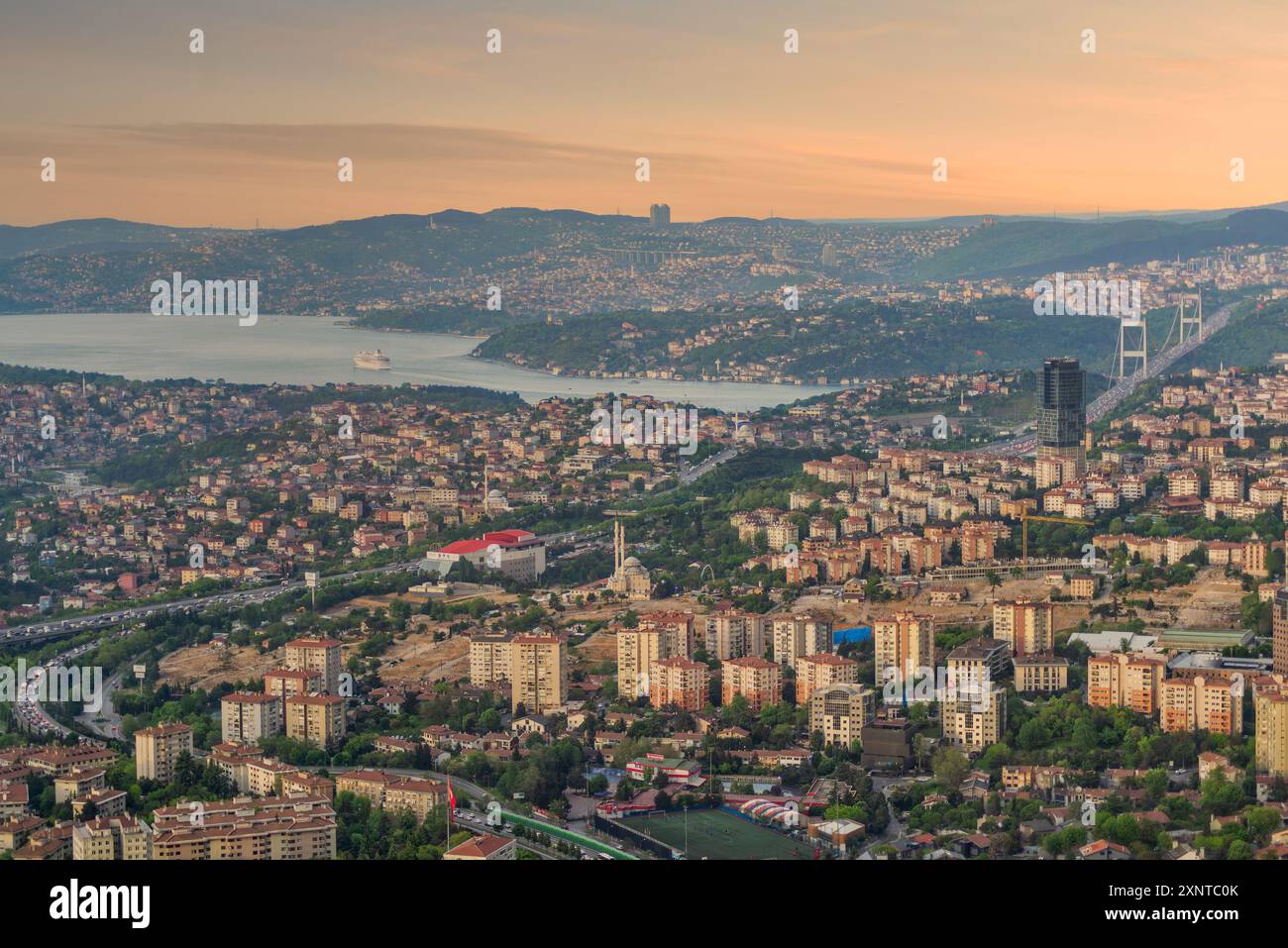 The urban skyline of Istanbul, Turkey is captured at sunset, showcasing ...