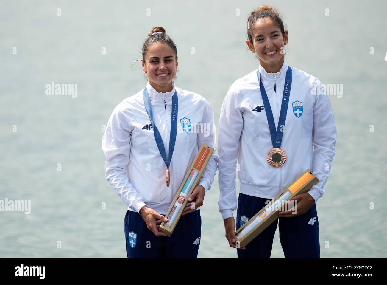 Greece's Dimitra Kontou and Zoi Fitsiou pose with the bronze medal in ...