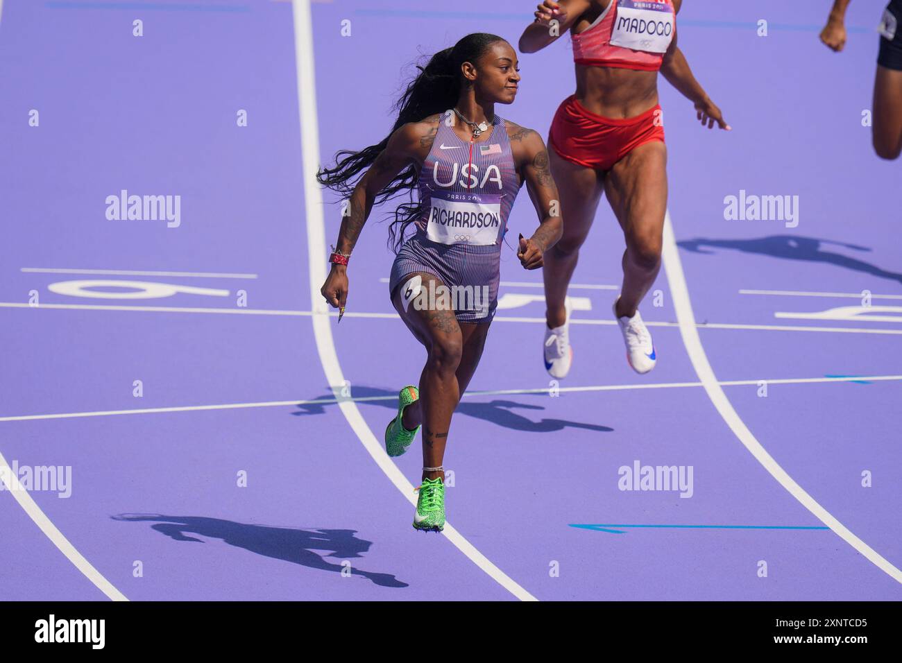 Sha'Carri Richardson of Team USA crosses the finish line to win her ...