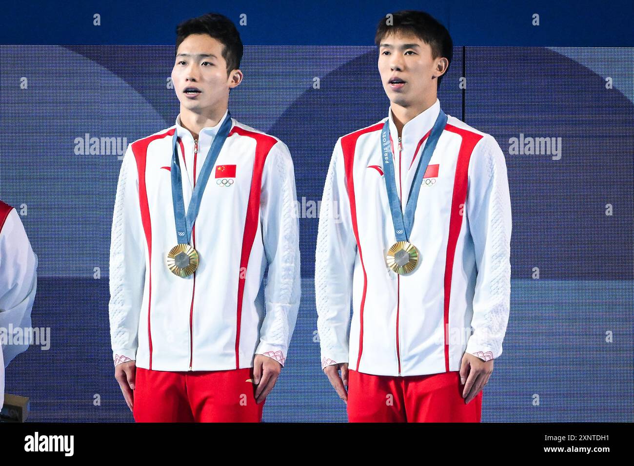 LONG Daoyi and WANG Zongyuan of China celebrate with his gold medal ...
