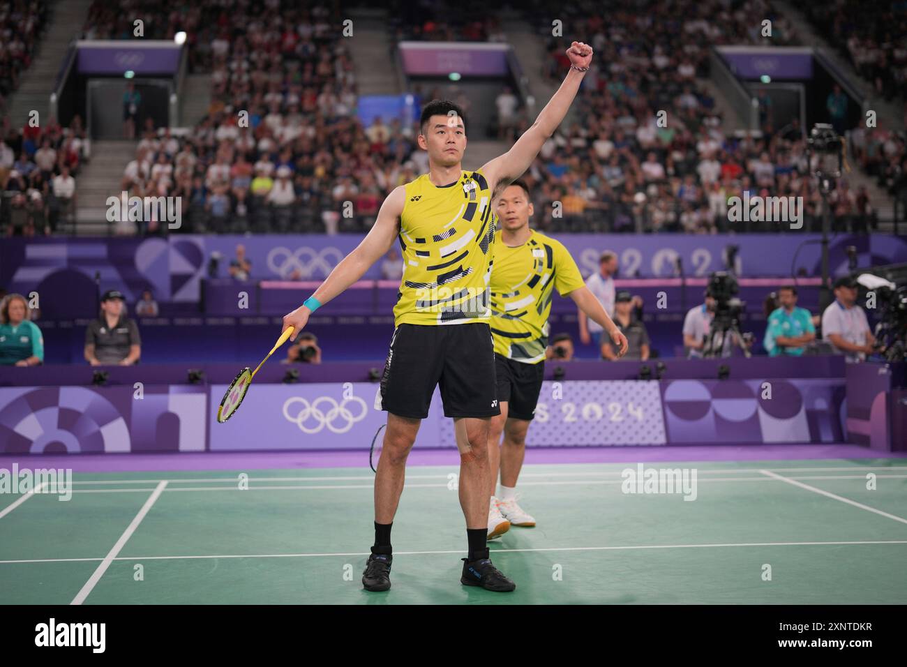Taiwan's Lee Yang, rear, and Wang Chi-Lin celebrate after defeating ...