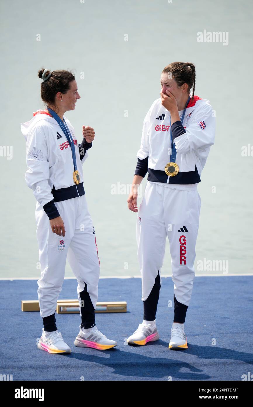 Britain's Emily Craig and Imogen Grant celebrate with the gold medal in ...