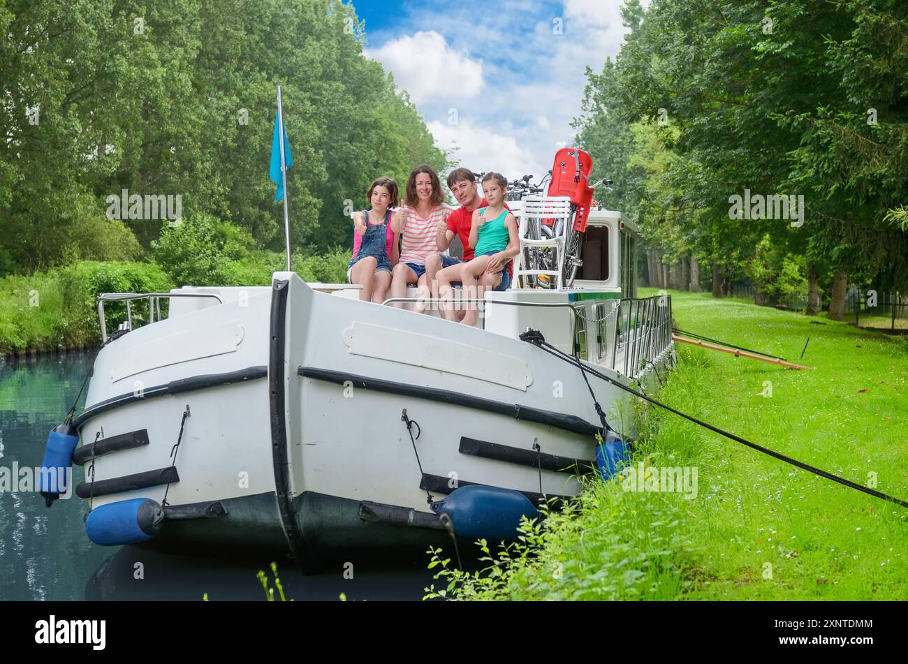 Family vacation, summer holiday travel on barge boat in canal, happy ...